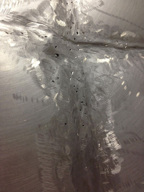 Tank Surface Damage: Pitting, Corrosion, and Deformation